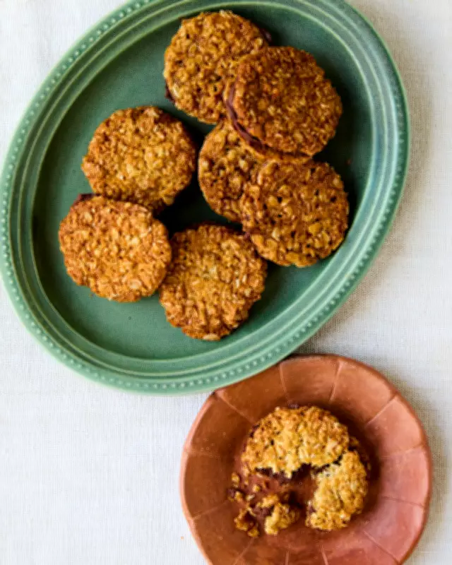 Helen Goh's Anzac Sandwich Biscuits with Dark Chocolate Filling Recipe ...